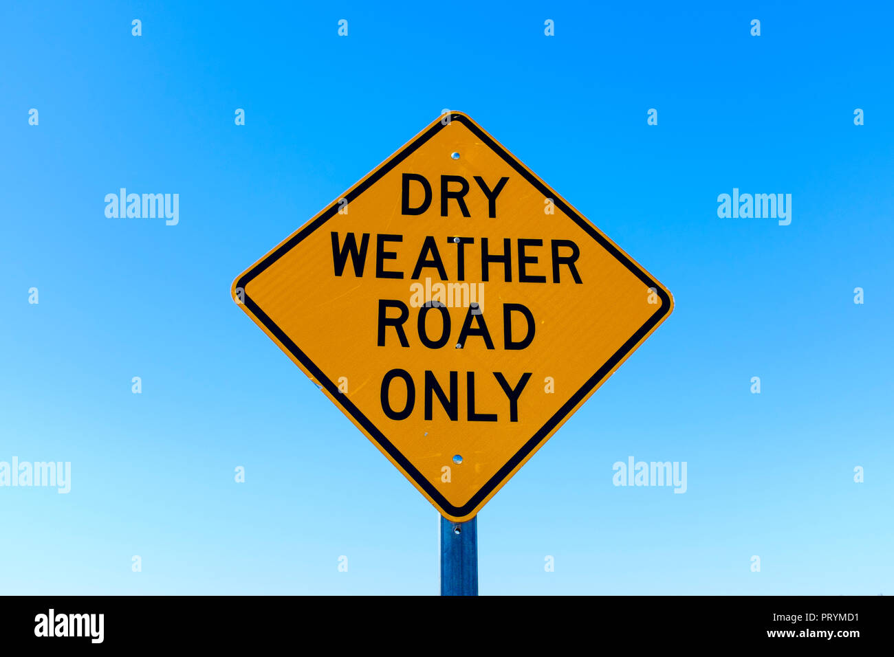 Road sign dry weather road only, Australia Stock Photo - Alamy