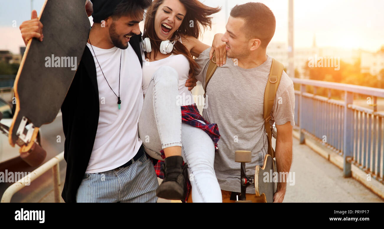 Group of happy friends hang out together Stock Photo - Alamy