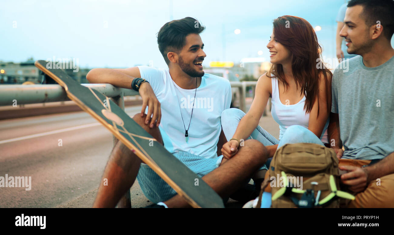 Group of happy friends hang out together Stock Photo - Alamy