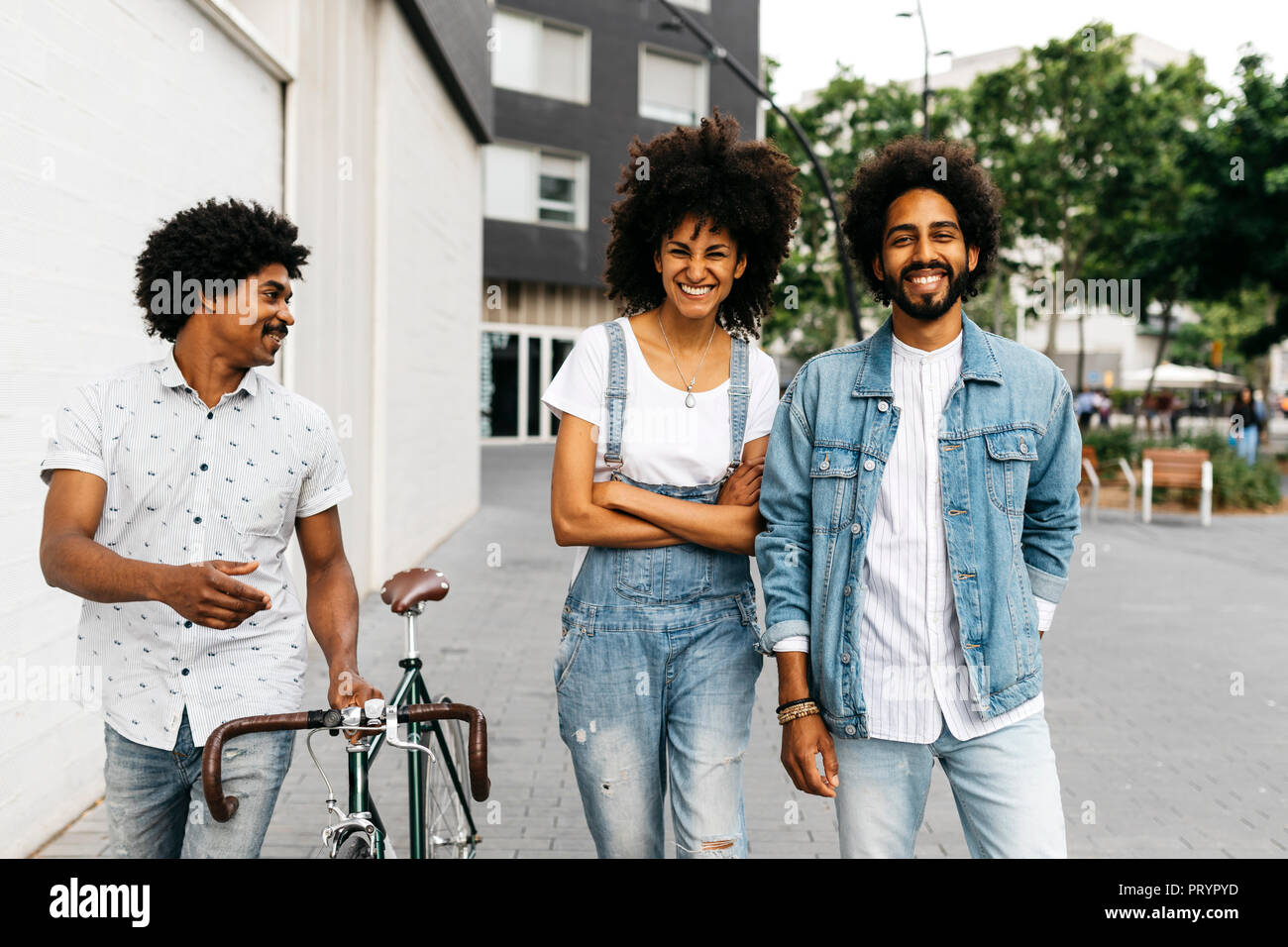 Three friends having fun together Stock Photo - Alamy
