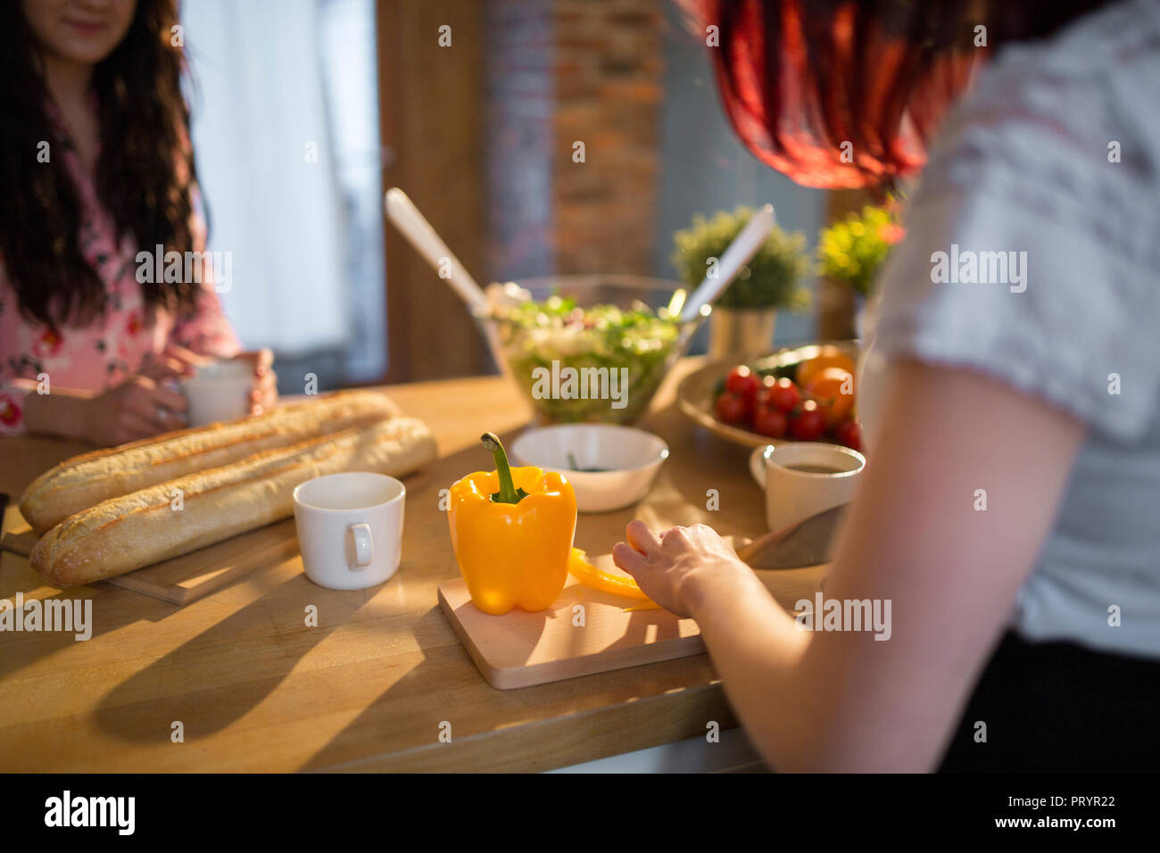 Preparing supper hi-res stock photography and images - Alamy