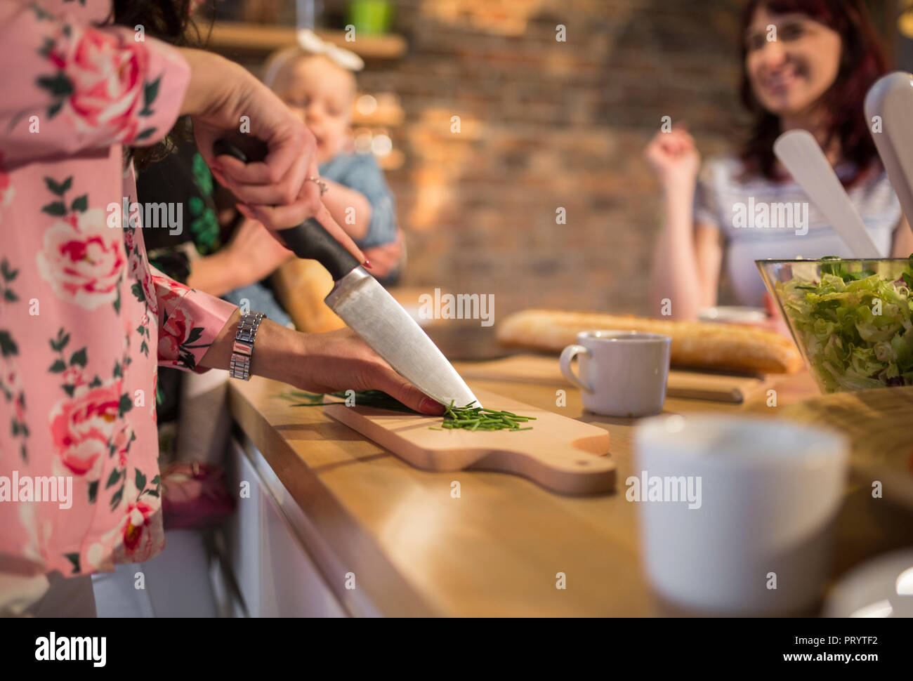 Preparing supper hi-res stock photography and images - Alamy
