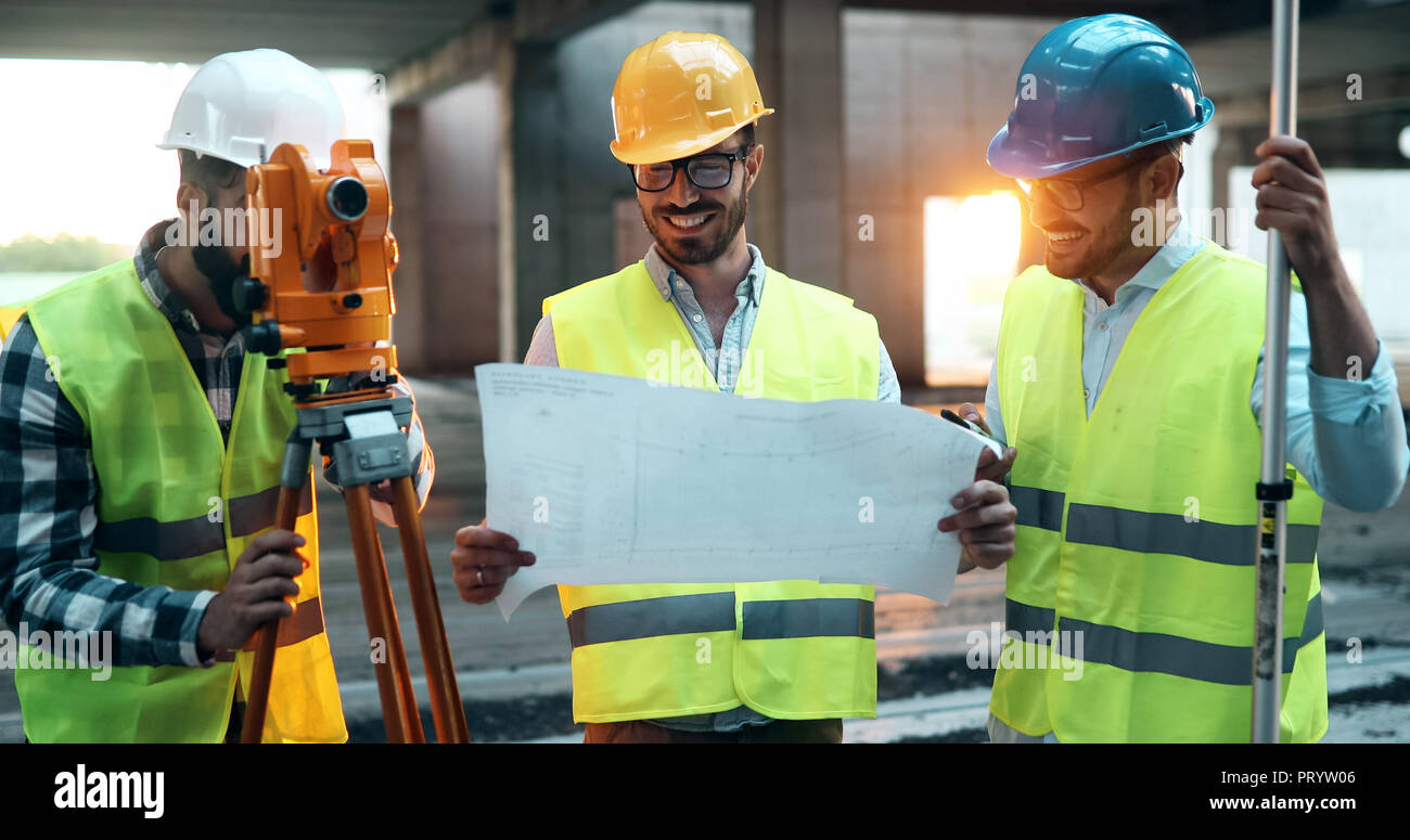 Group of engineering team had meeting at working site Stock Photo - Alamy