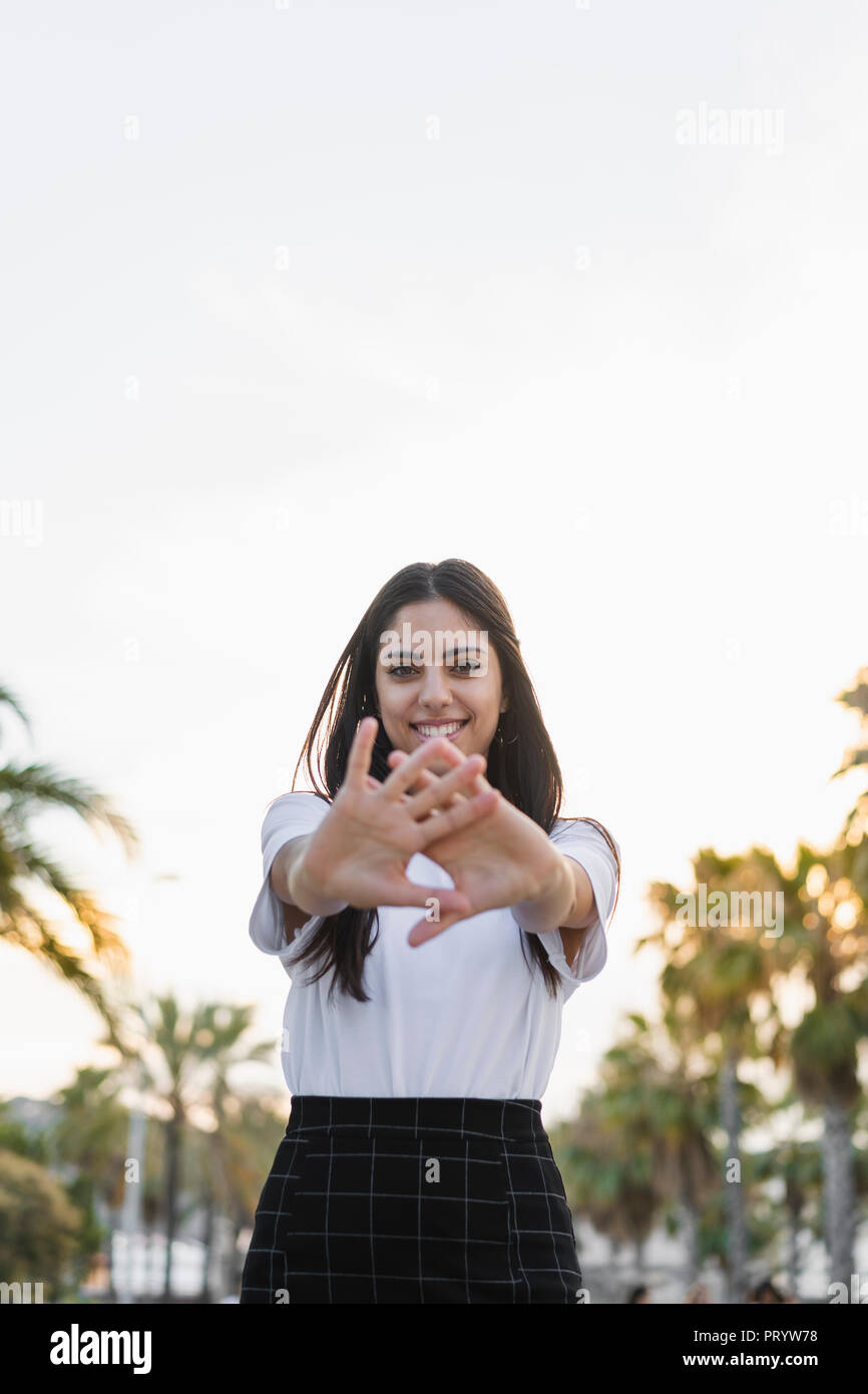 Young woman reaching out hi-res stock photography and images - Alamy