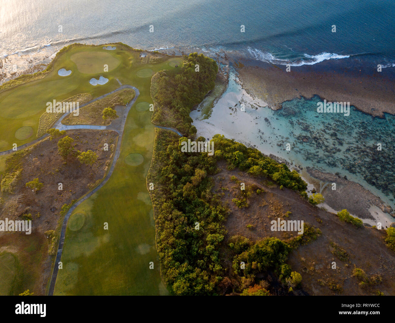 Indonesia, Bali, Aerial view of golf course with bunker and green at ...