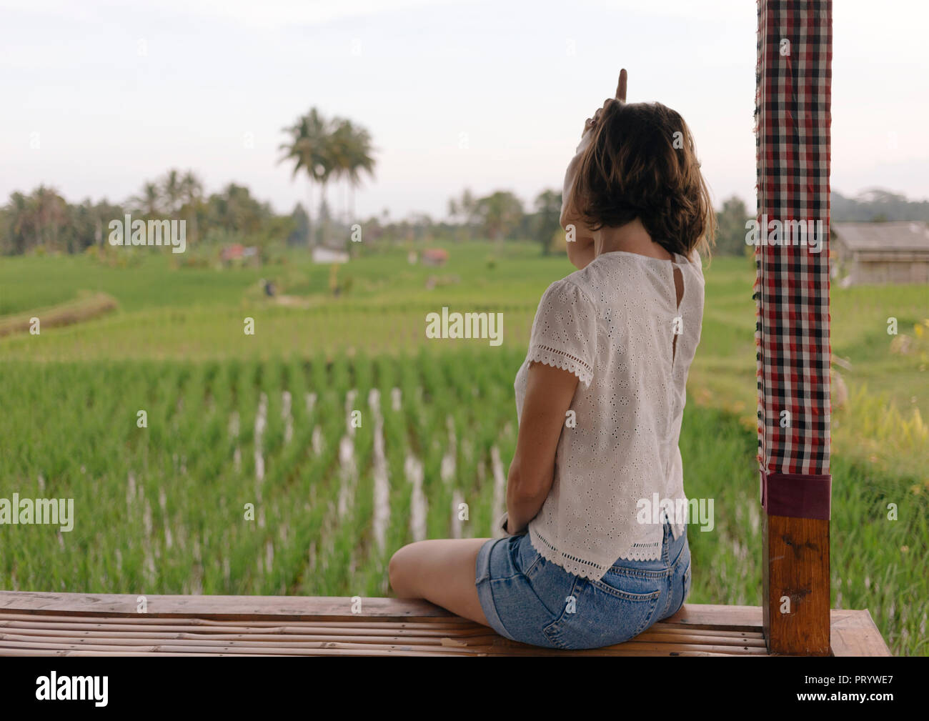 Young woman on a rice field hi-res stock photography and images - Alamy
