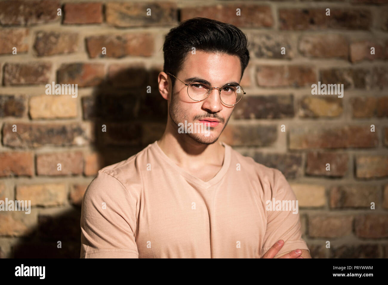 Man brick wall hi-res stock photography and images - Alamy