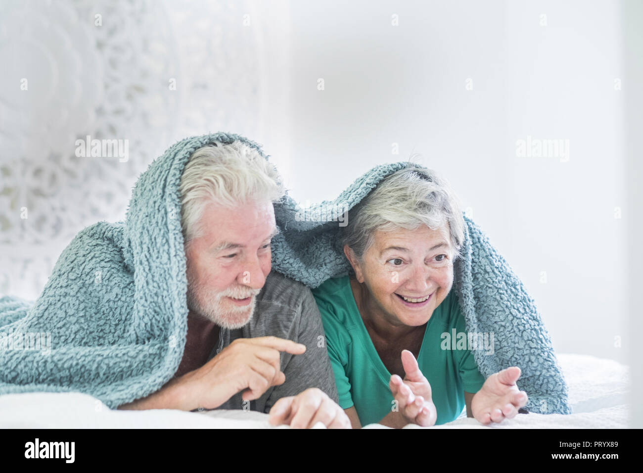 Couple under sheets hi-res stock photography and images - Alamy
