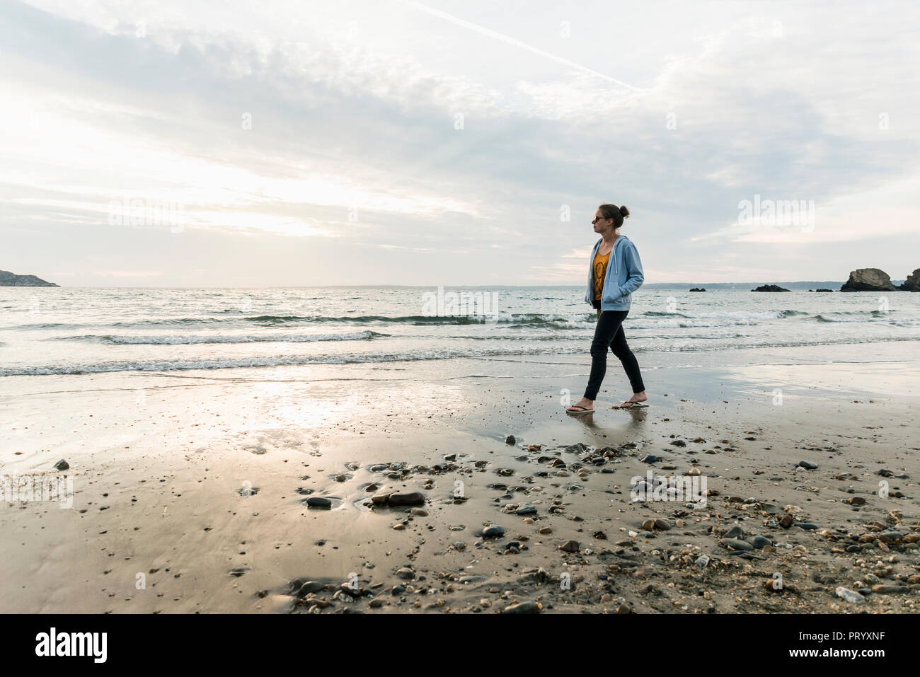 Woman watching the beach hi-res stock photography and images - Alamy