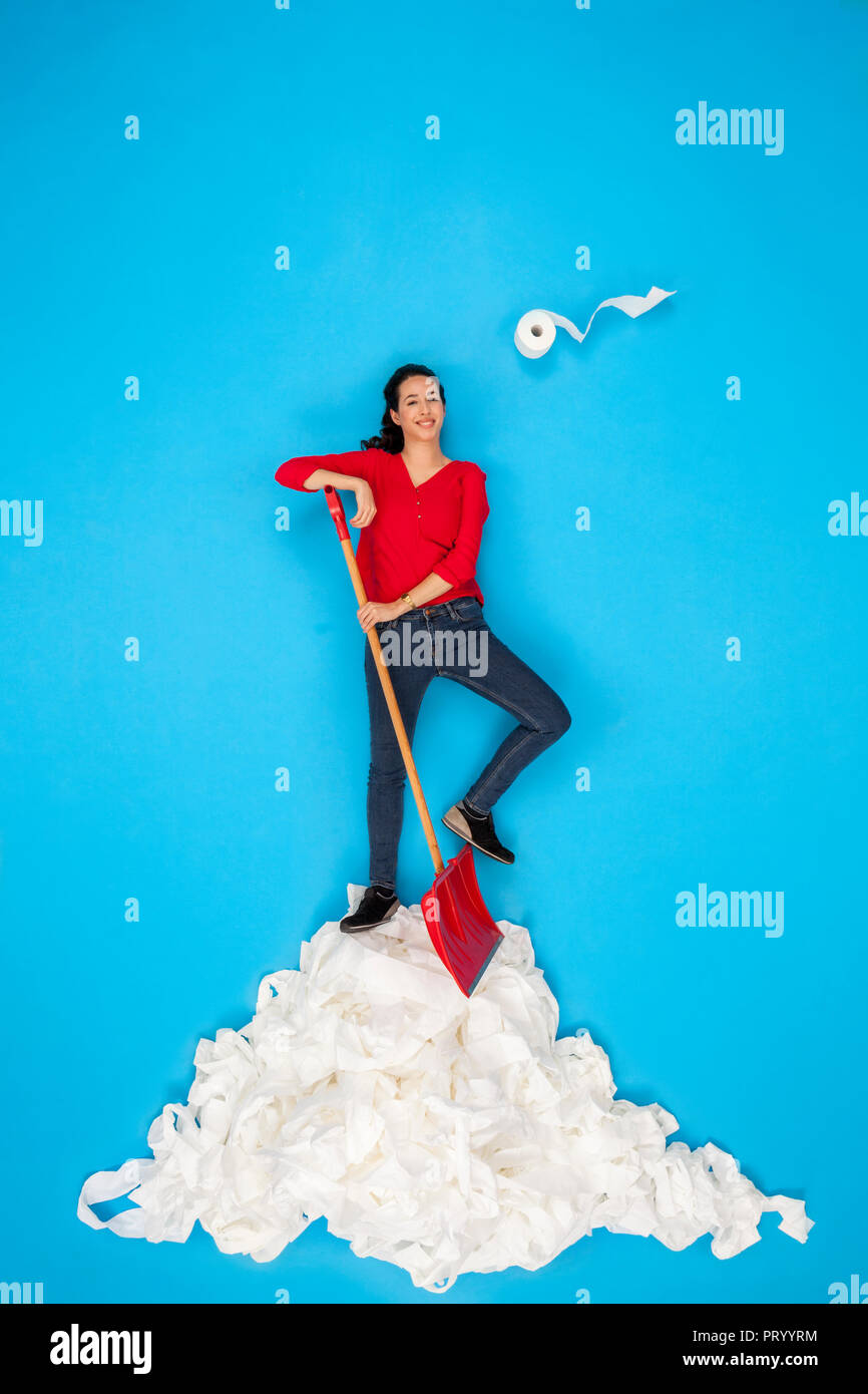 Woman shoveling snow hi-res stock photography and images - Alamy