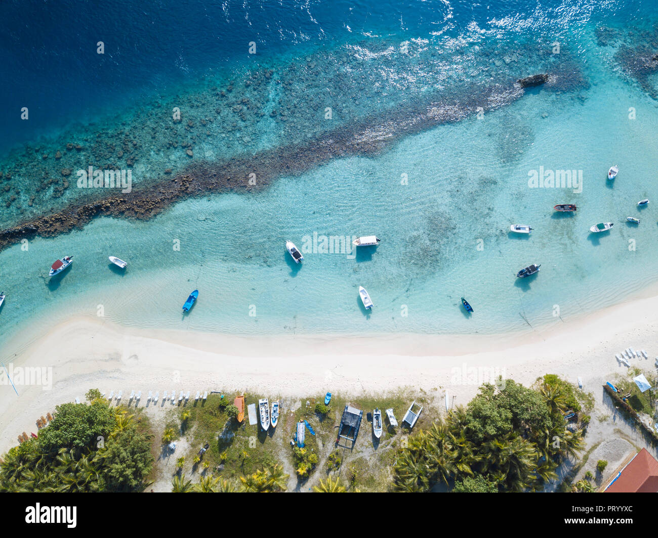 Maldives, Aerial view of beach and boats Stock Photo - Alamy