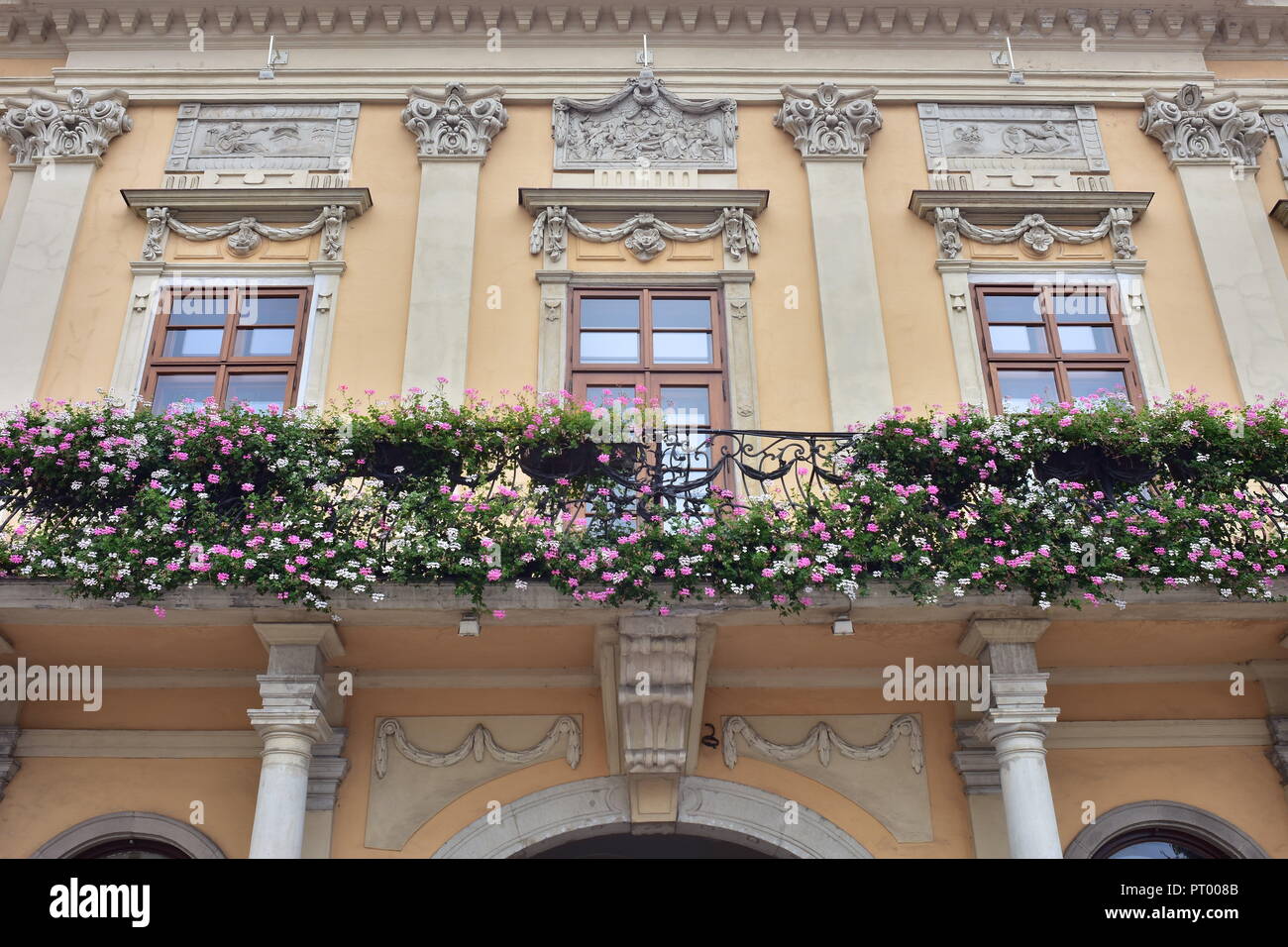 Facade detail of baroque town house in Kosice. Windows are decorated ...
