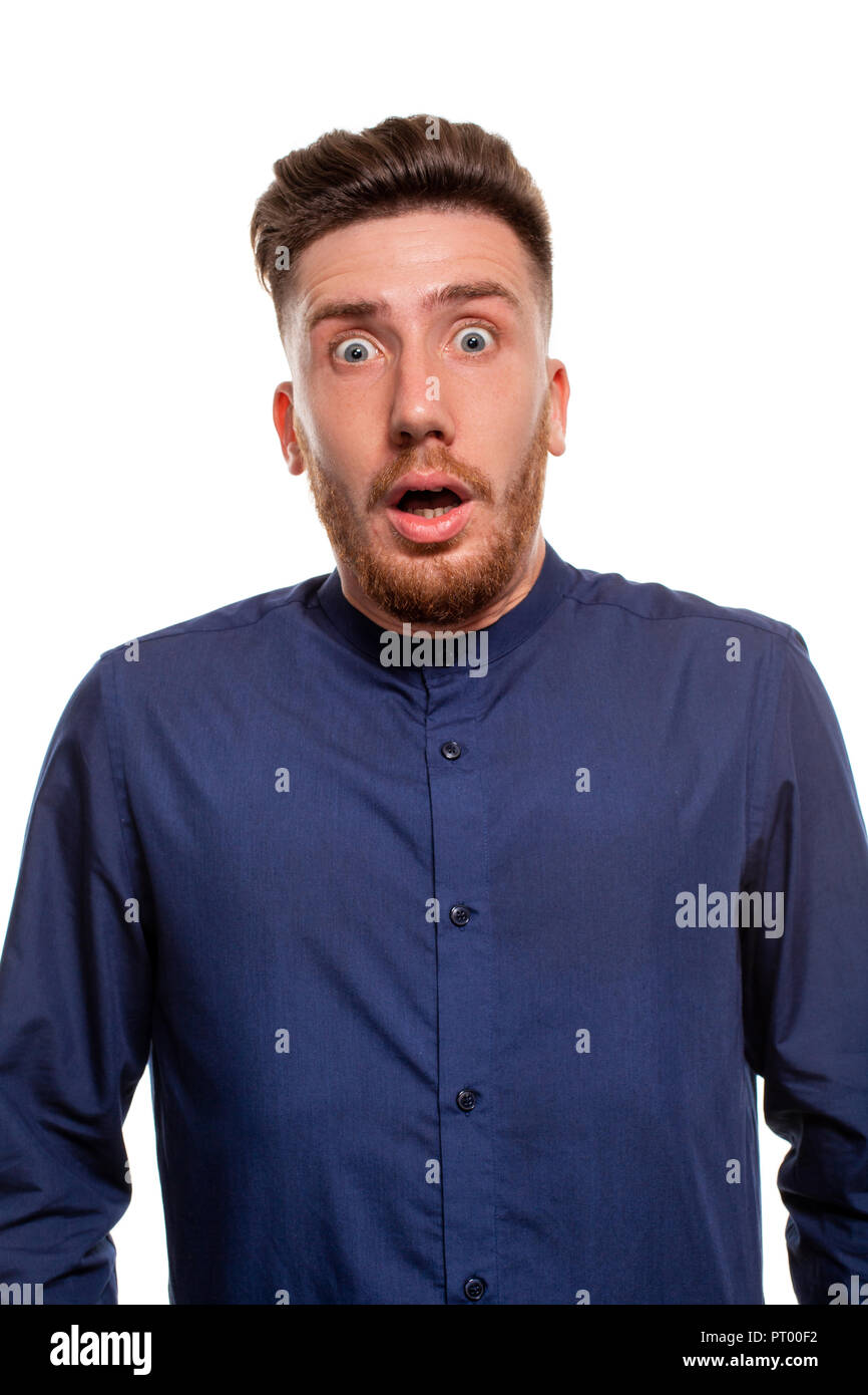 Vertical shot of stupefied stunned shocked young male keeps mouth ...