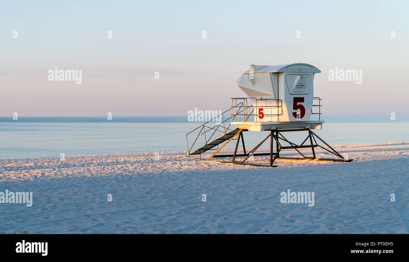 Lifeguard station on empty tranquil beach with white sand on the Gulf ...