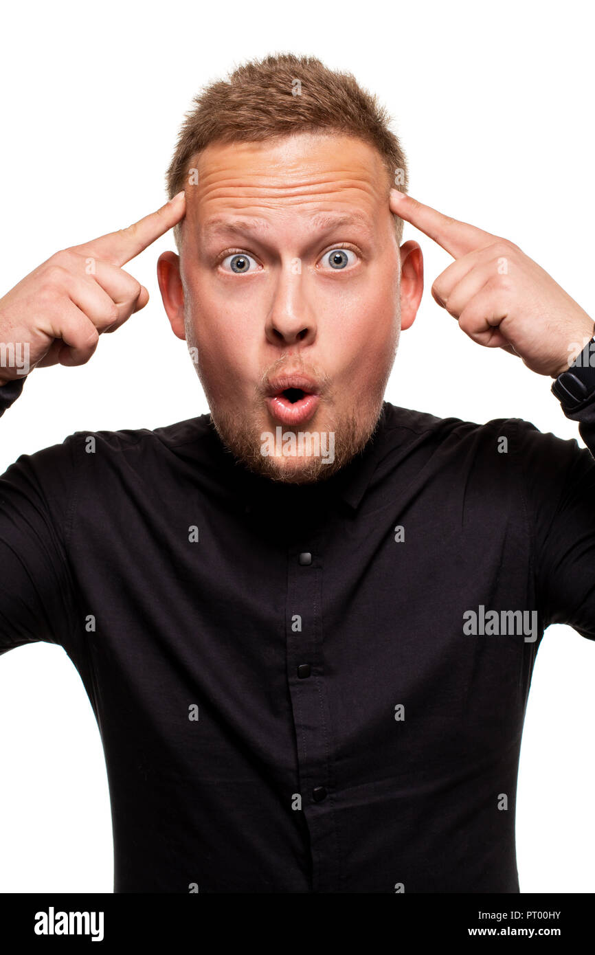 Vertical shot of stupefied stunned shocked young male keeps mouth ...