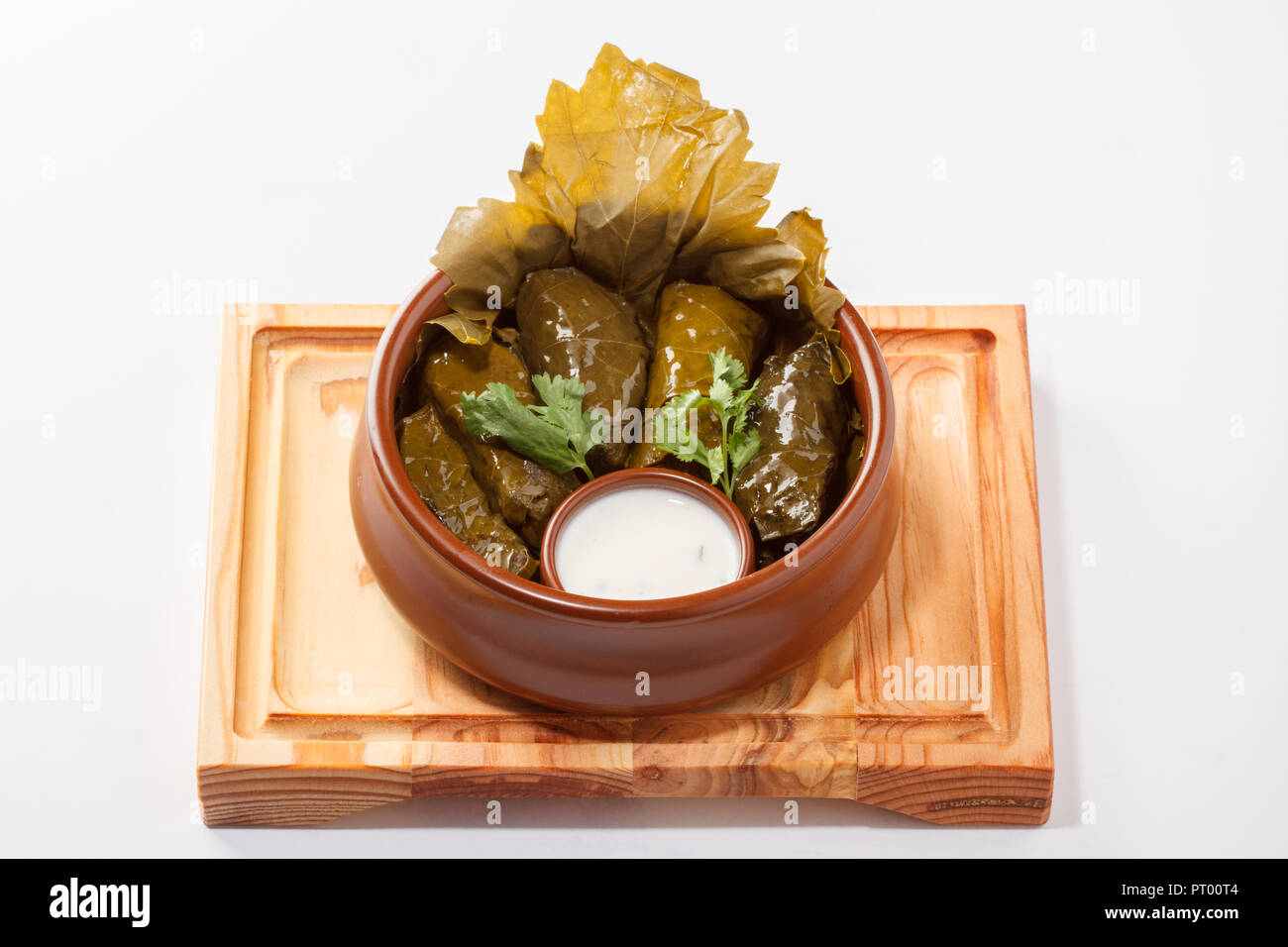 Traditional Dolma - stuffed meat in vine leafs served in Clay pot with ...