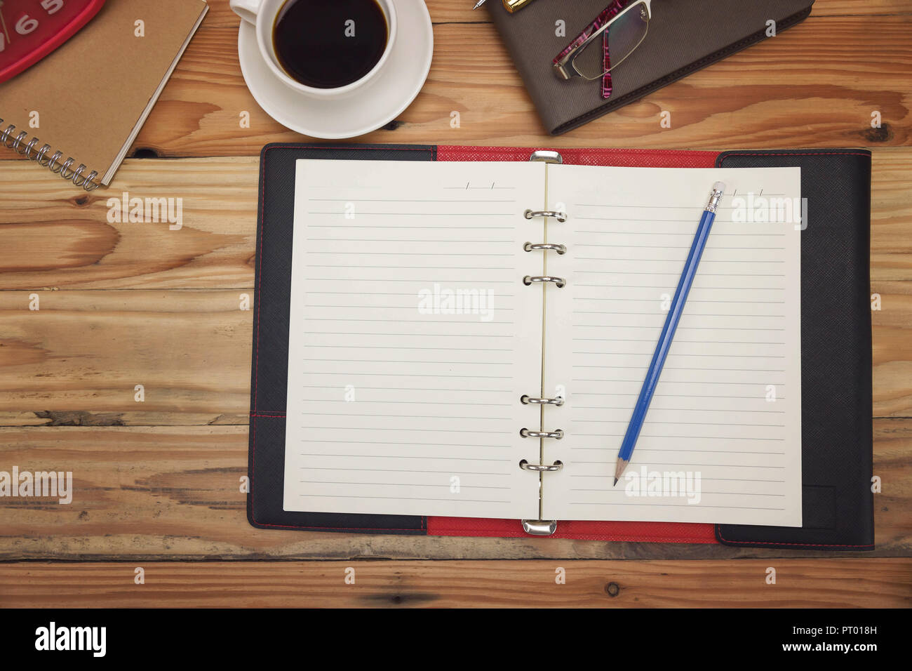 Top view of office desk with paper, stationery and analysis chart Stock ...