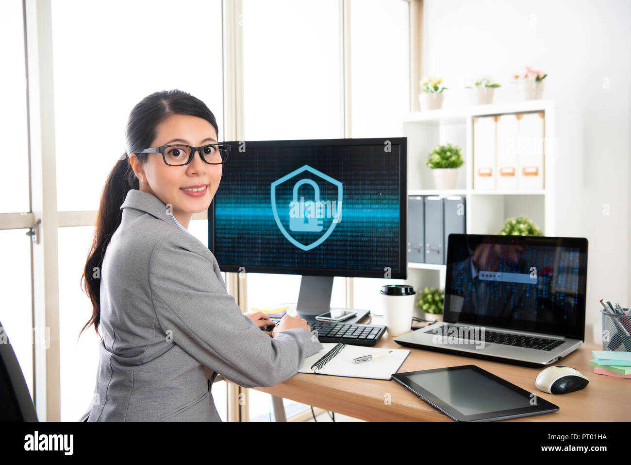 professional cyber security company worker sitting in the office and ...