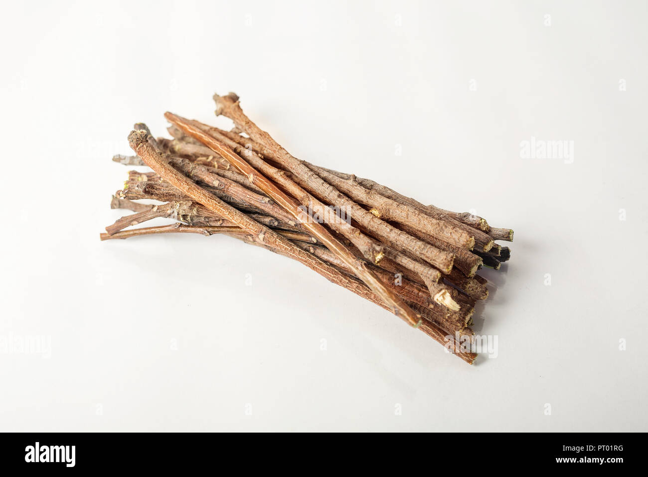 Neem wooden sticks. white isolated background Stock Photo - Alamy