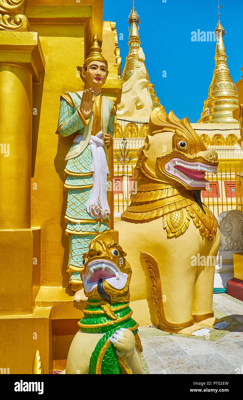 Traditional Buddhist sculptures of Nat Spirit and Chinthe leogryphs at ...