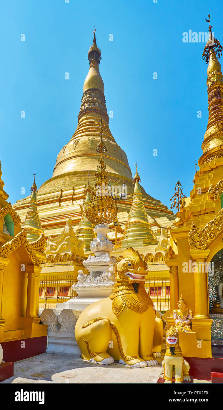 The large statue of chinthe (leogryph) among the outer stupas of ...