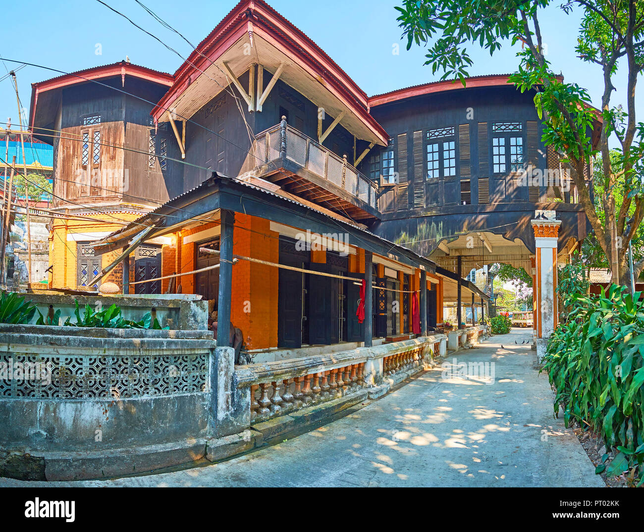 The old Colonial style wooden house at the Chaukhtatgyi Buddha Temple ...