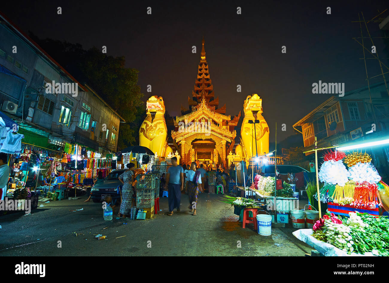 YANGON, MYANMAR - FEBRUARY 27, 2018: The night market at the Eastern ...