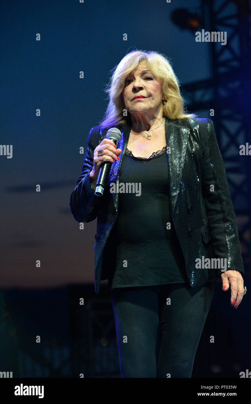 Singer Nicoletta on stage during a concert of the association “Enfant ...