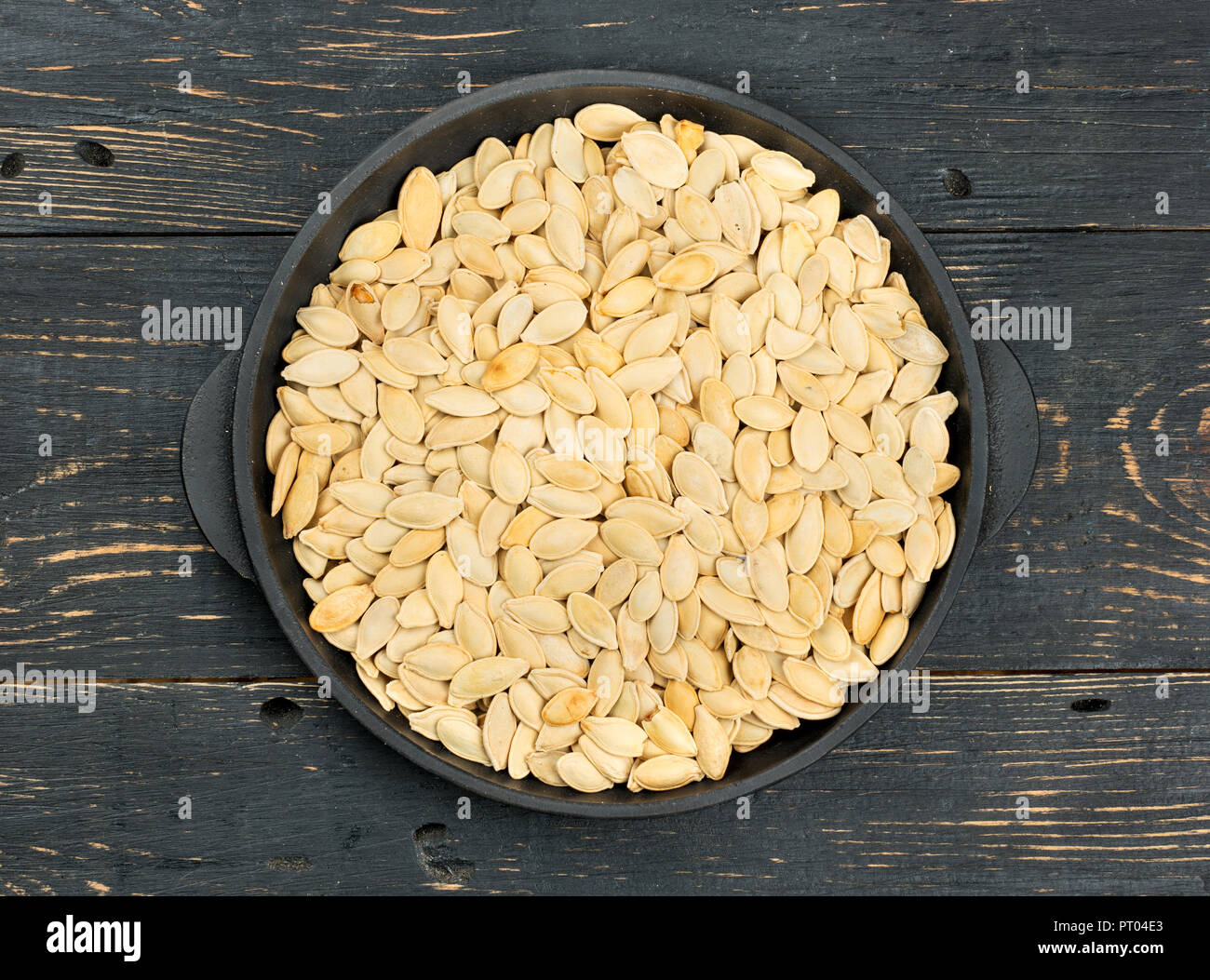 Pumpkin seeds pan roasted hi-res stock photography and images - Alamy
