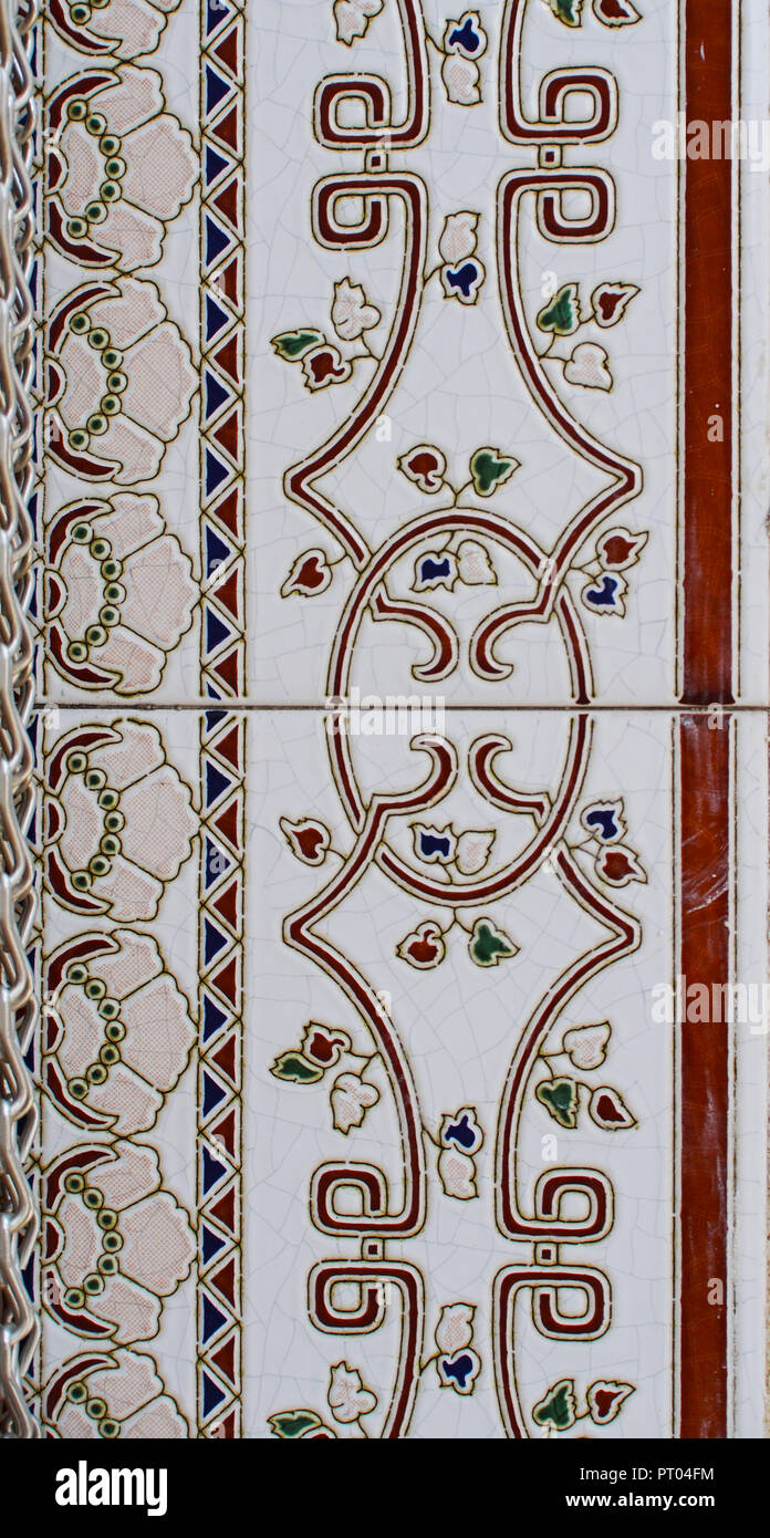 Detail of the traditional tiles from facade of old house. Decorative ...