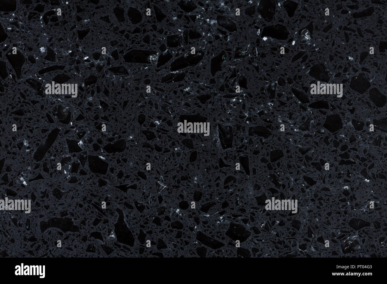 Shiny exquisite background of black synthetic rock Stock Photo - Alamy