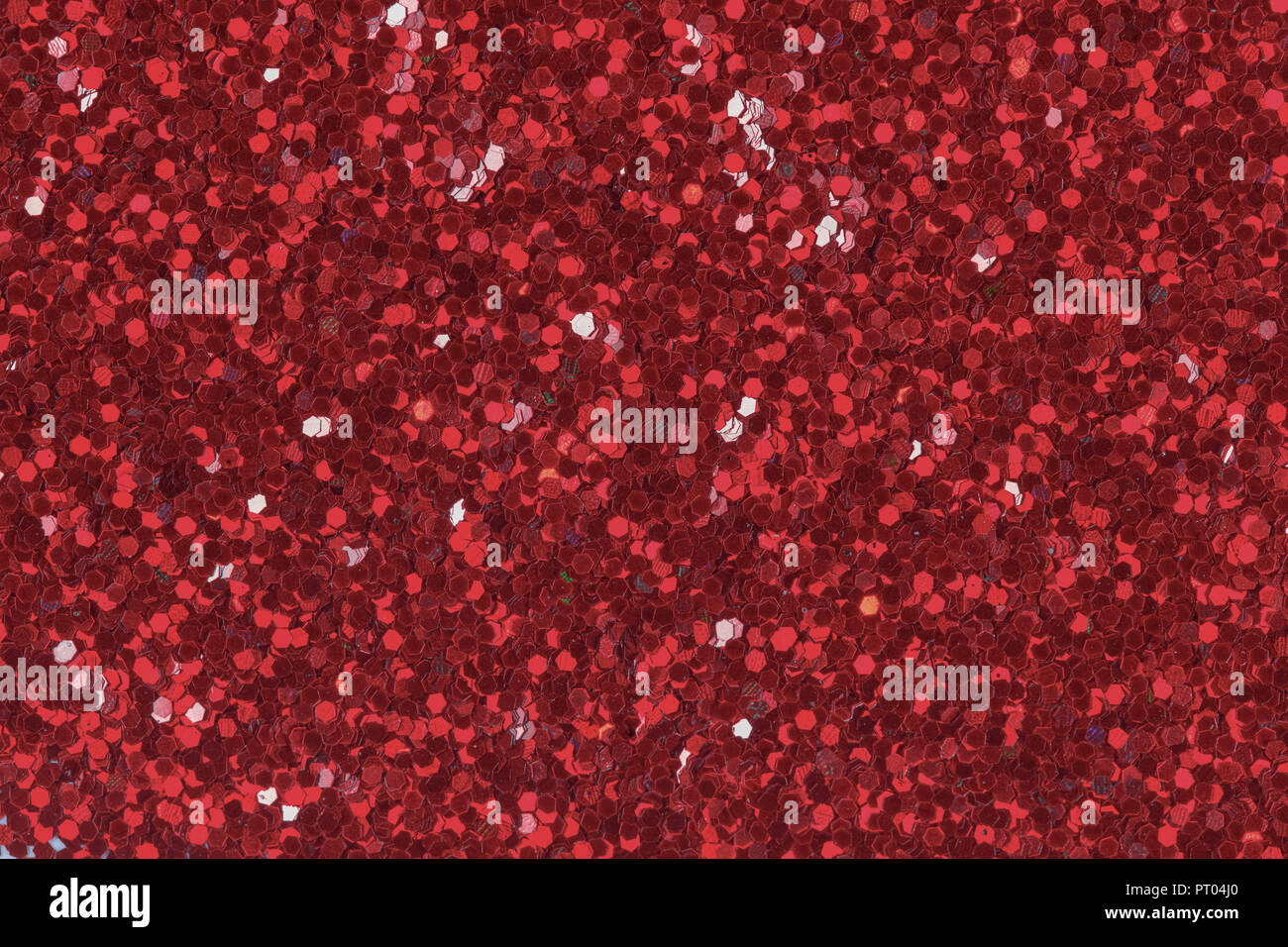 Red glitter texture for background. Low contrast photo Stock Photo - Alamy