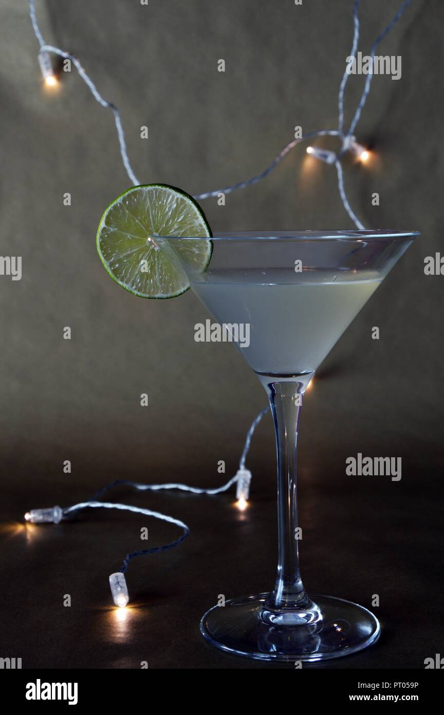 glass of daiquiri cocktail on golden background Stock Photo - Alamy