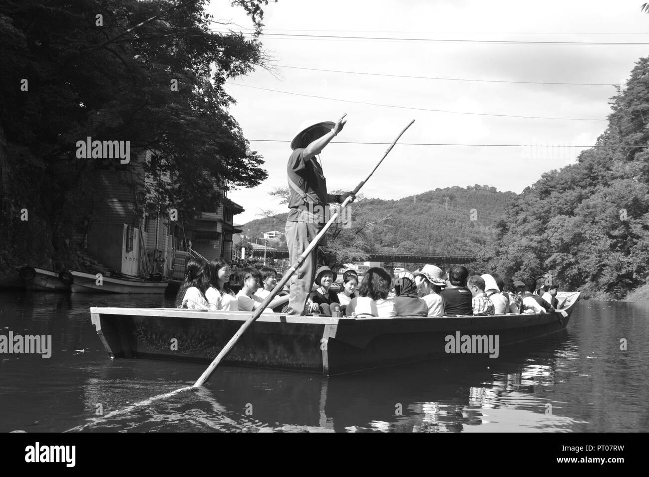 Man tourist in boat Black and White Stock Photos & Images - Alamy