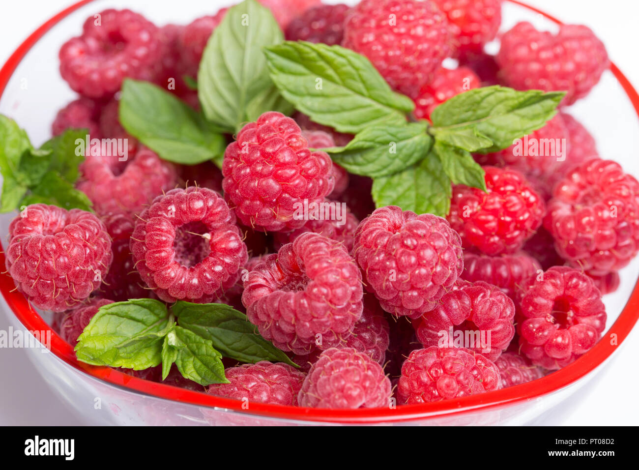 Raspberry with leaves isolated on white background Stock Photo - Alamy