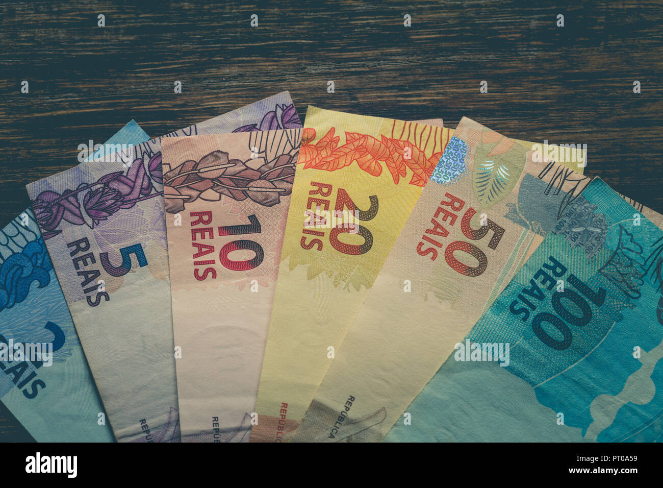 Brazilian money, reais on the table, different denomination Stock Photo ...