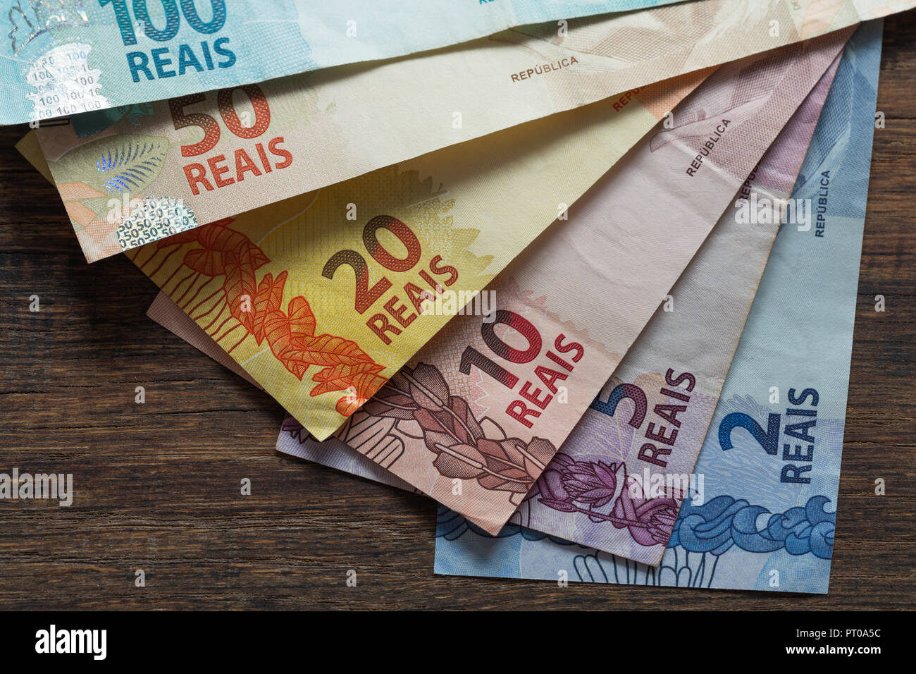 Brazilian money, reais on the table, different denomination Stock Photo ...