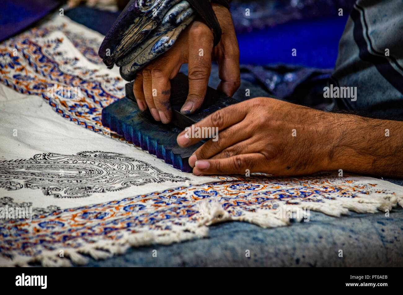 A man hand printing a Persian Rug in the Grand Bazaar at Imam Square in ...
