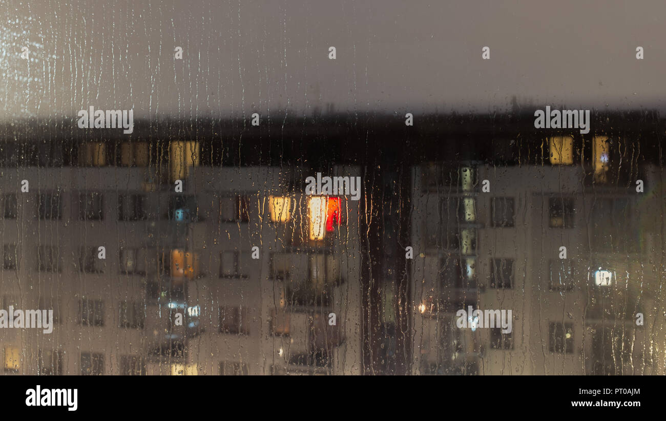 rainy evening and the view of the rain-covered glass through which you ...