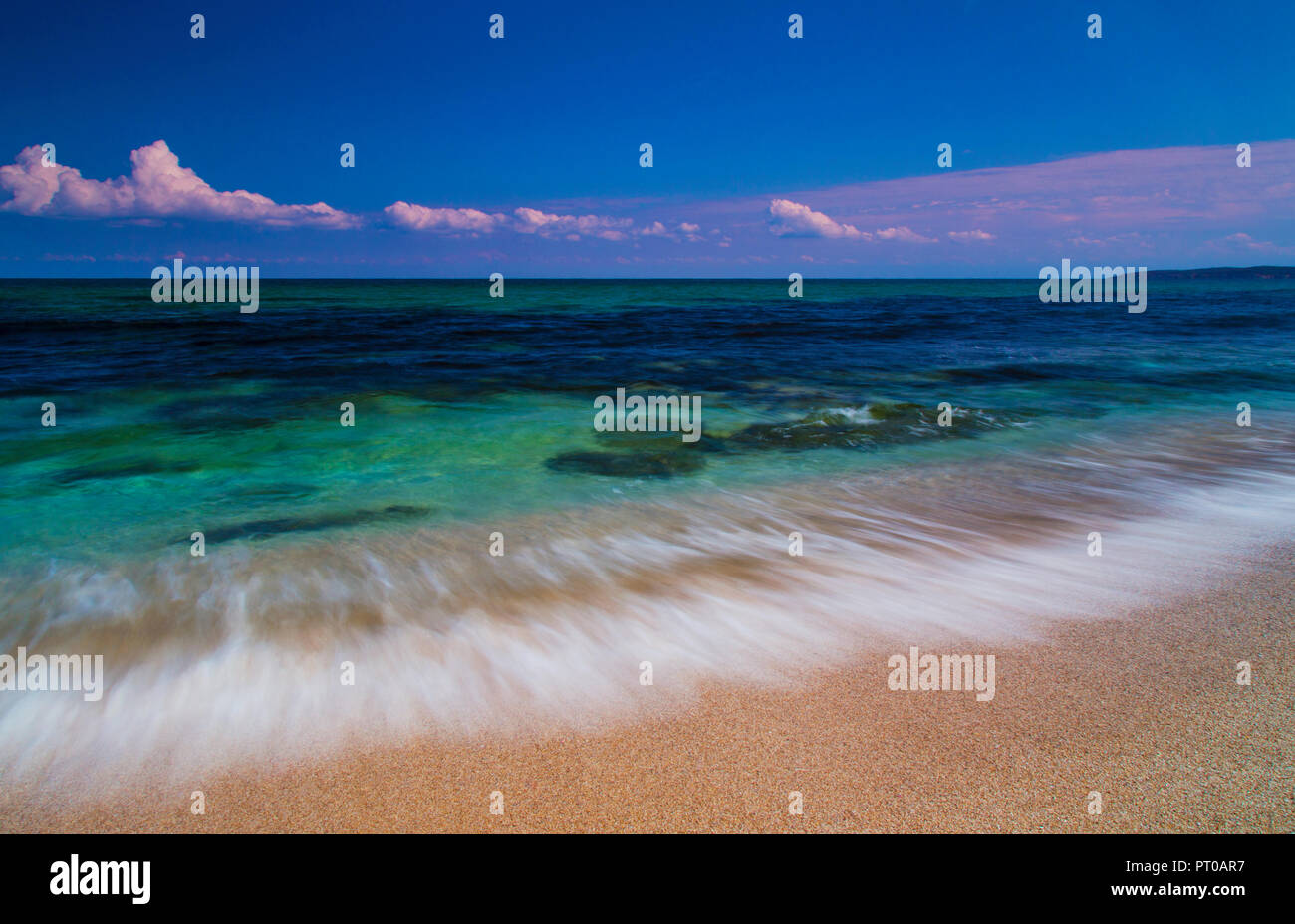Beautiful summer landscape with sea waves on the beach Stock Photo - Alamy
