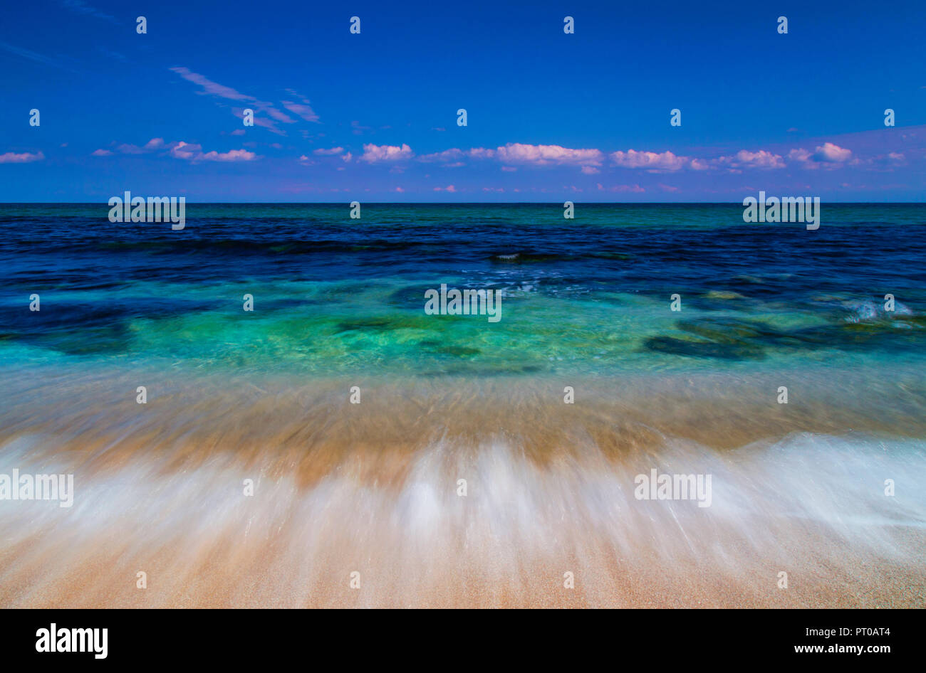 Beautiful summer landscape with sea waves on the beach Stock Photo - Alamy