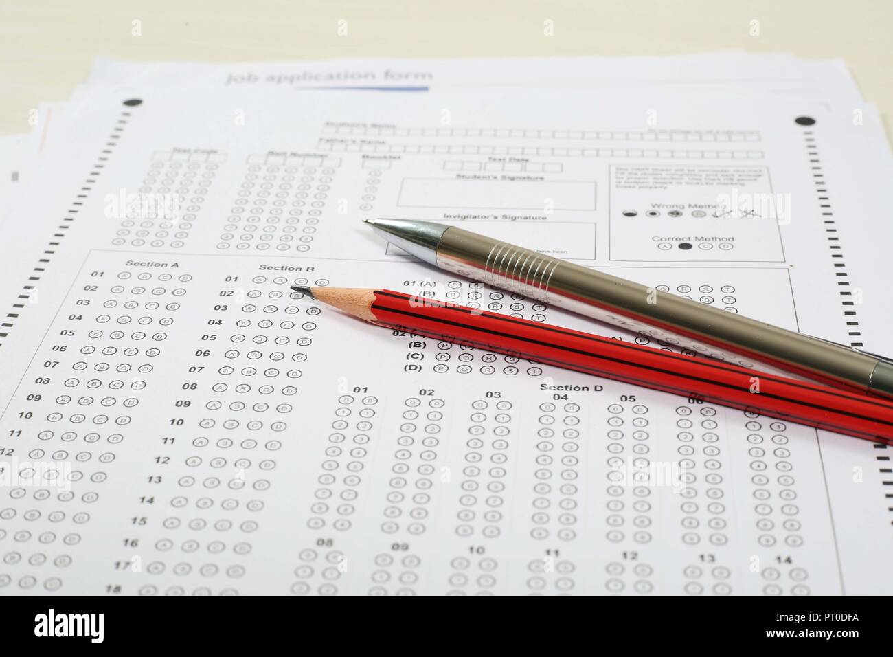 Picture of many exam sheet, pencil and pen. Isolated on white ...