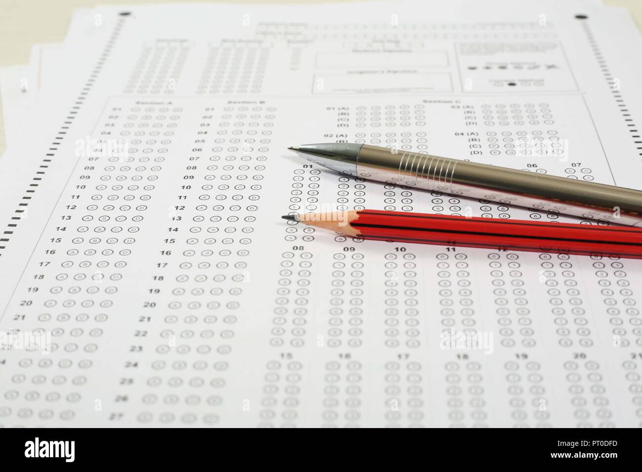 Picture of multiple omr sheet, pencil and pen. Isolated on white ...
