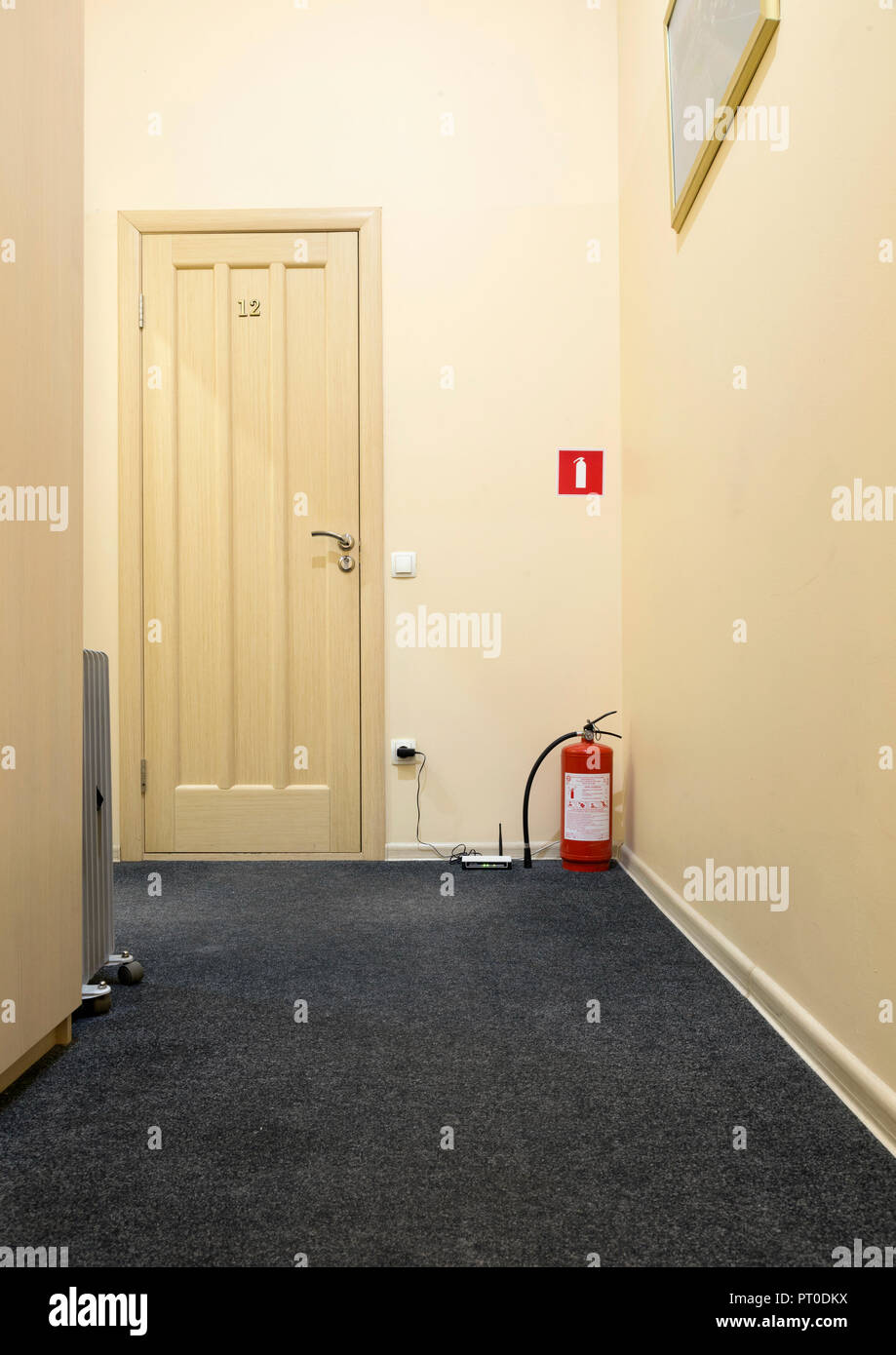 Corridor of a hotel with a wi fi router on the floor Stock Photo - Alamy
