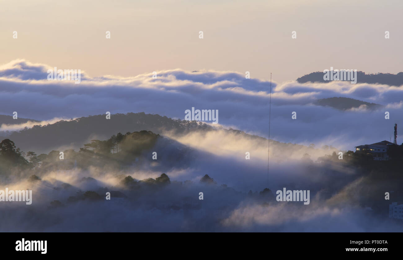 The fog cover Dalat plateau lands, Vietnam, background with magic of ...