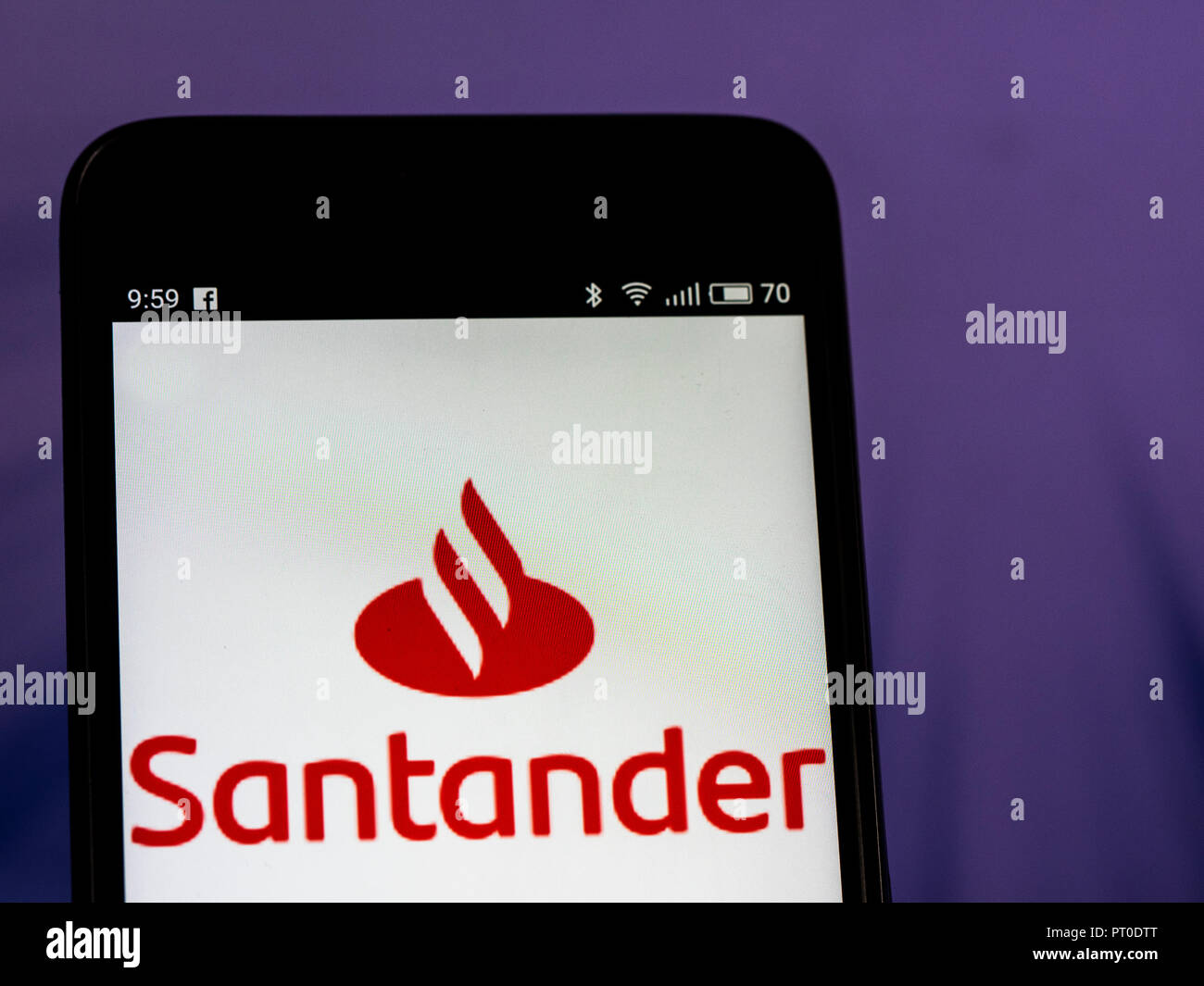Banco Santander logo seen displayed on smart phone. Santander Group is ...