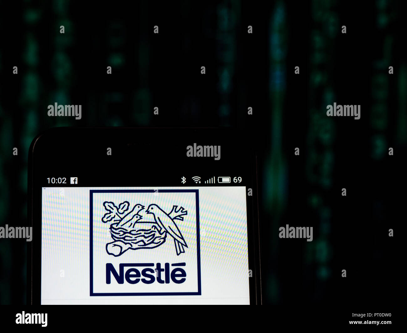 Nestle logo seen displayed on smart phone. Nestle S.A. is a Swiss ...