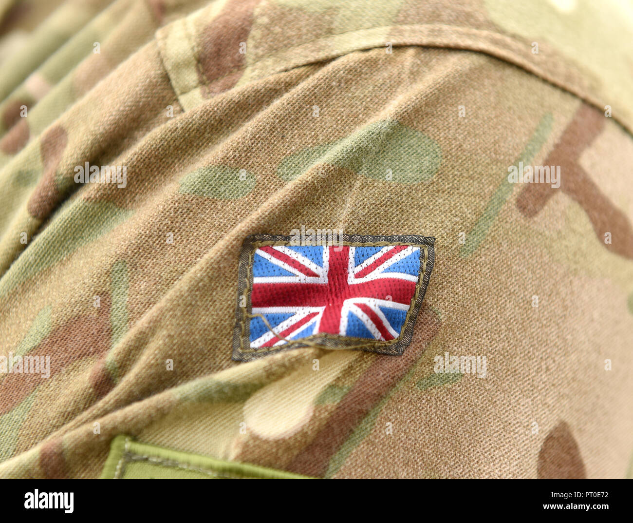 UK patch flag on soldiers arm. UK military uniform. United Kingdom ...