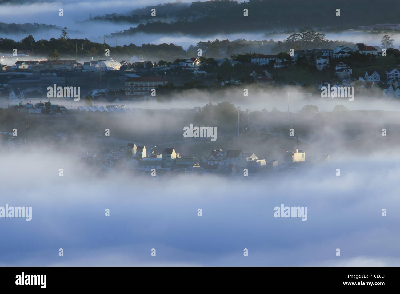 The fog cover Dalat plateau lands, Vietnam, background with magic of ...