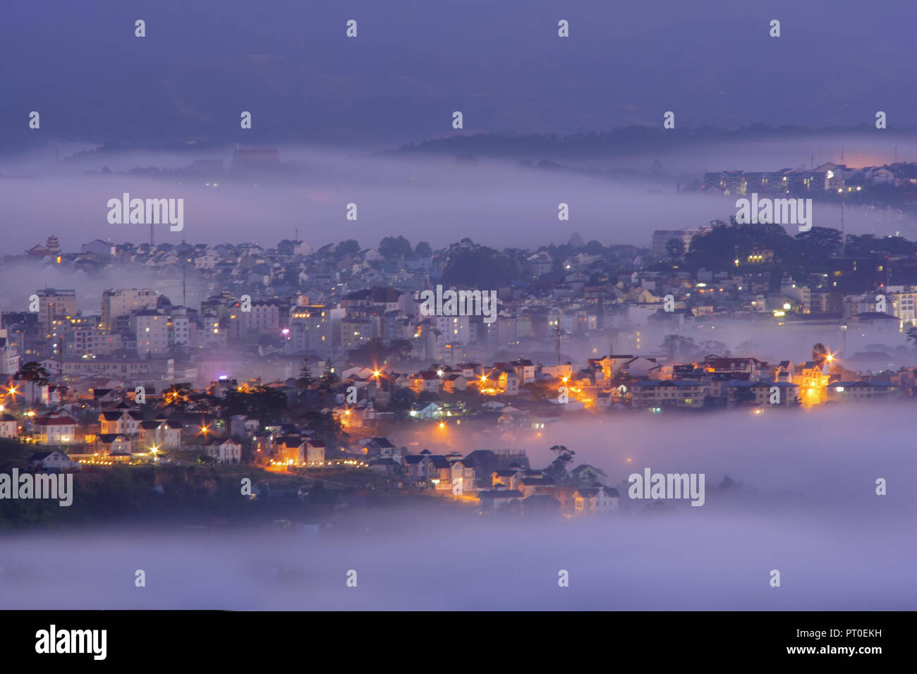 The fog cover Dalat plateau lands, Vietnam, background with magic of ...